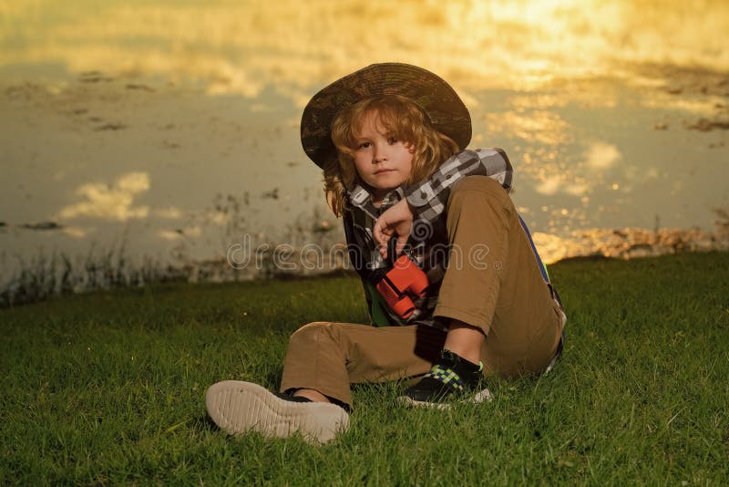 Scout Boy Wearing Explorer Hat and Backpack Outdoor. Explorer and ...