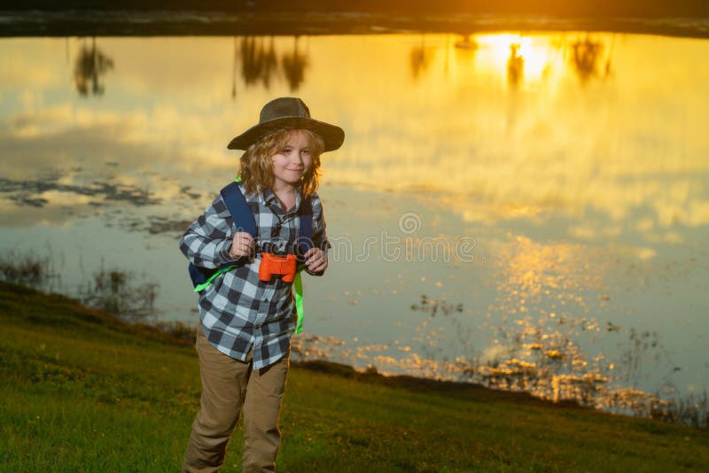 Scout Boy Wearing Explorer Hat and Backpack Outdoor. Explorer and ...