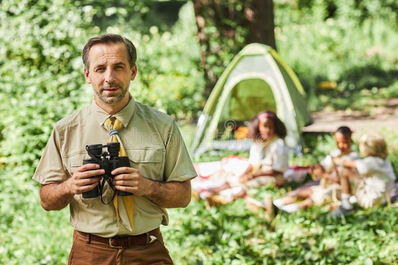 Adult Man As Scout Leader Looking at Camera Outdoors Stock Photo ...