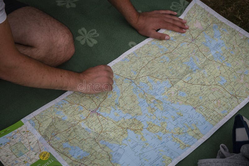 Scouts read a map stock photo. Image of discovery, maker - 238474660