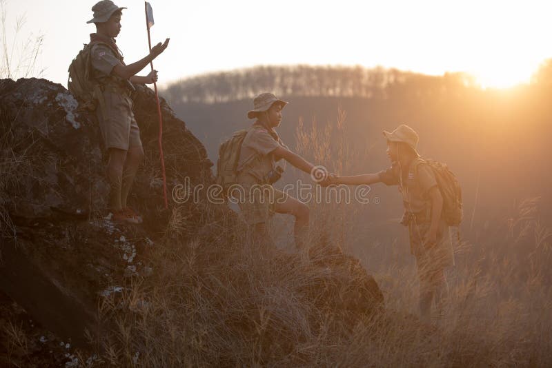Scouts Work As a Team. Help Stock Photo - Image of africa, crop: 282081344