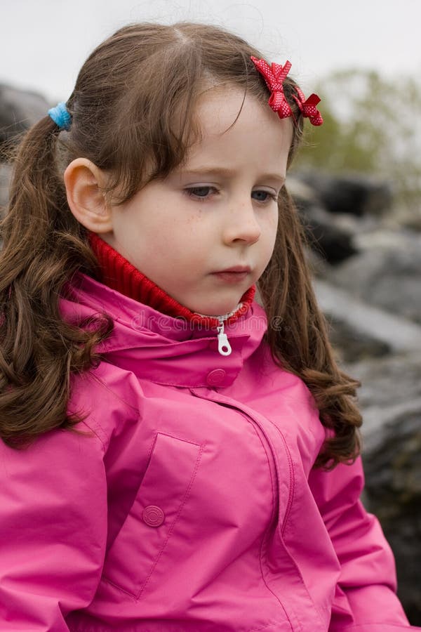 Scowled girl stock photo. Image of little, blue, round - 10399530