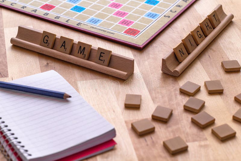 Scrabble Board Game with the Scrabble Tile Spell `Game Night` Editorial ...