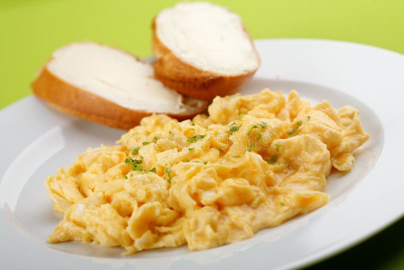 Scrambled Eggs and Bread with Butter Stock Photo - Image of scrambled ...