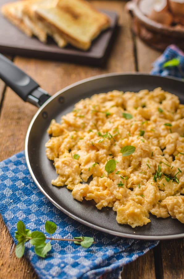 Scrambled Eggs Rustic Style Stock Photo - Image of lunch, board: 67361796
