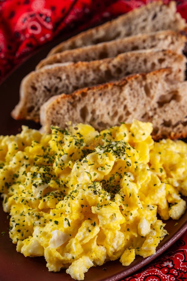 Scrambled Eggs and Slices of Artisan Bread Stock Image - Image of ...