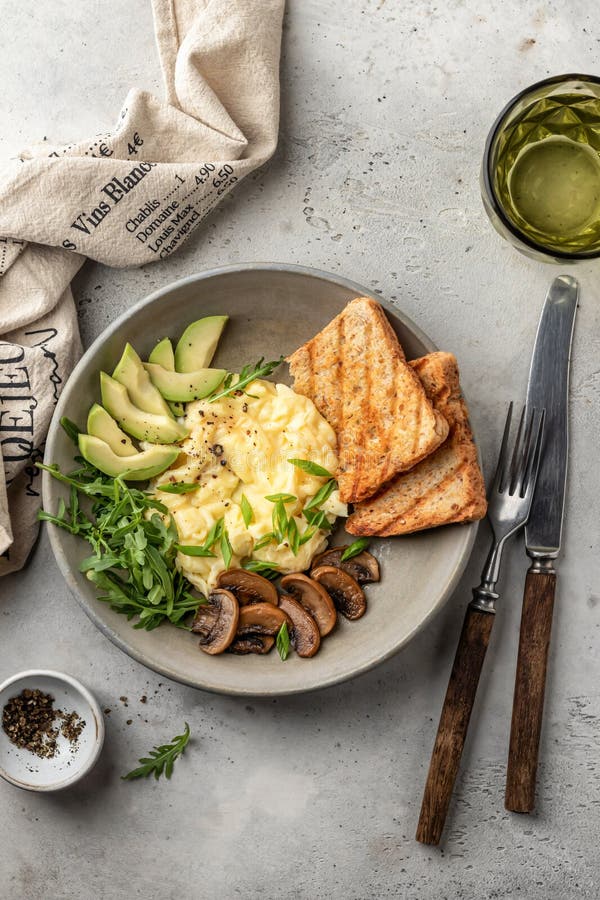 Scrambled Eggs, Toasts, Avocado and Mushrooms on Rustic Plate for ...