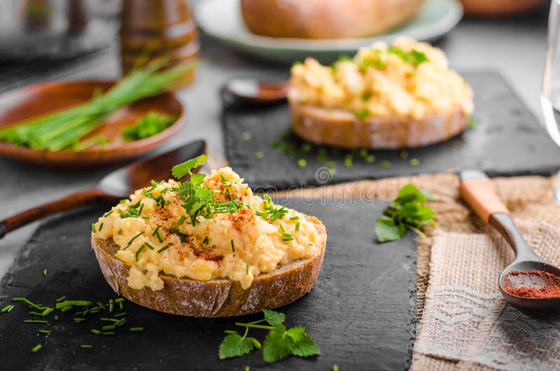 Scrambledd Eggs with Chive and Chilli Stock Photo - Image of eggs ...