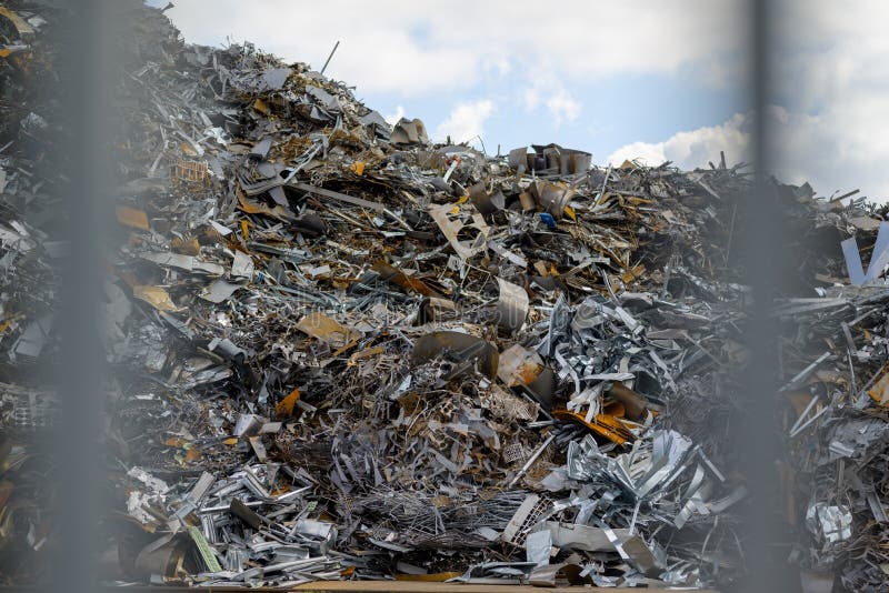 Scrap Dealer with a Huge Mountain of Steel Stock Image - Image of ...