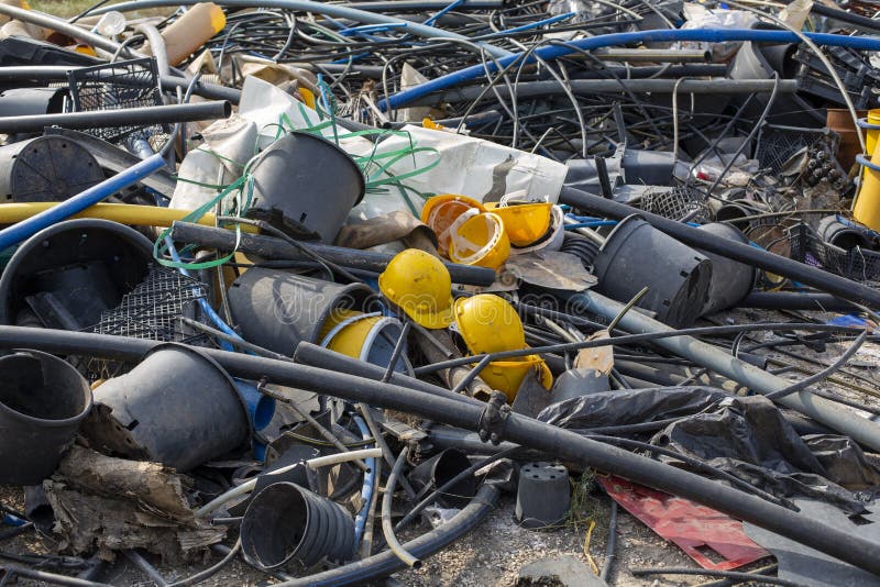 A scrap heap of plastics stock photo. Image of disposal - 216090364