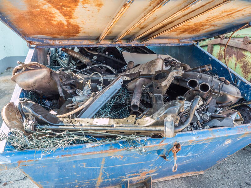Scrap metal in a container stock image. Image of dirty - 264496835