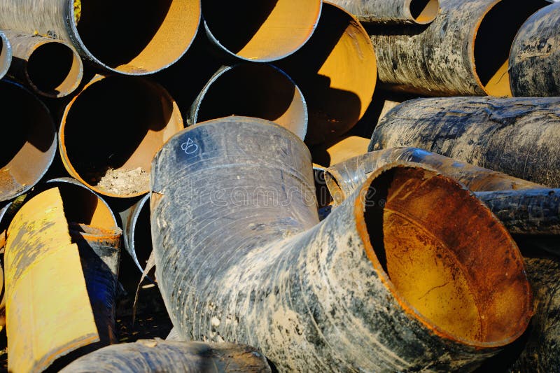Scrap Metal Dump. Old Used Gasification Pipes are Cut into Pieces and ...