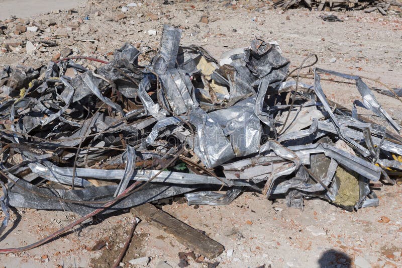 Scrap metal on the ground stock photo. Image of vehicle - 269962384