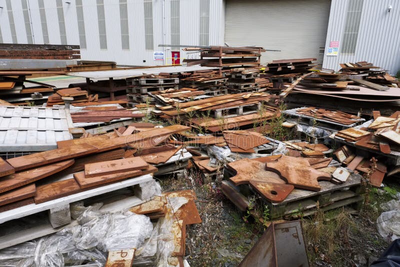 Scrap Metal Yard Stack of Steel and Iron Girders and Plates Stock Photo ...