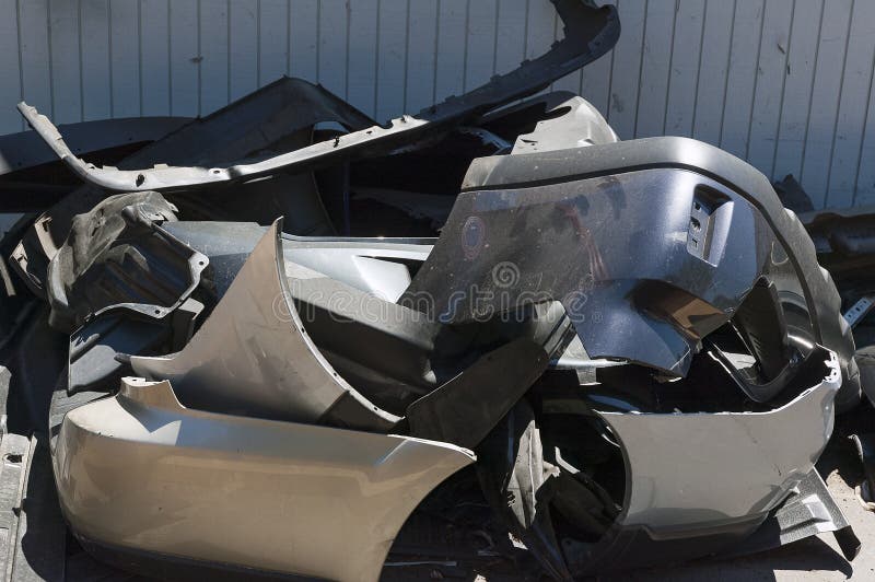 A Pile of Scrapped Car Bumpers. Land Pollution with Scrap Metal ...