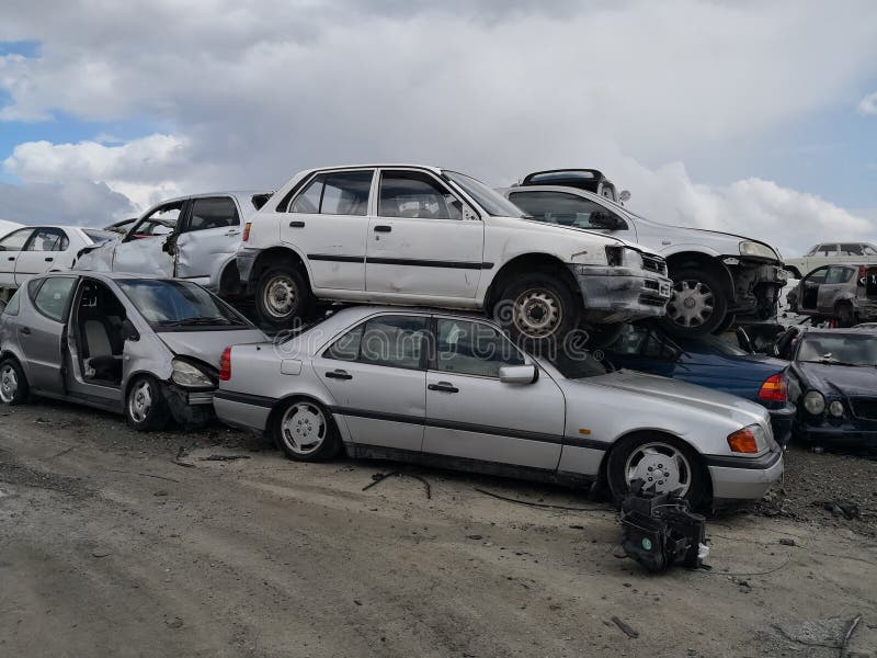 The Scrap Yard with Old Cars of Crushed Cars Stock Photo - Image of ...