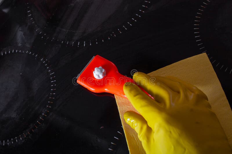 Scraper for Cleaning Glass Ceramics in the Hand in Rubber Glove Against ...