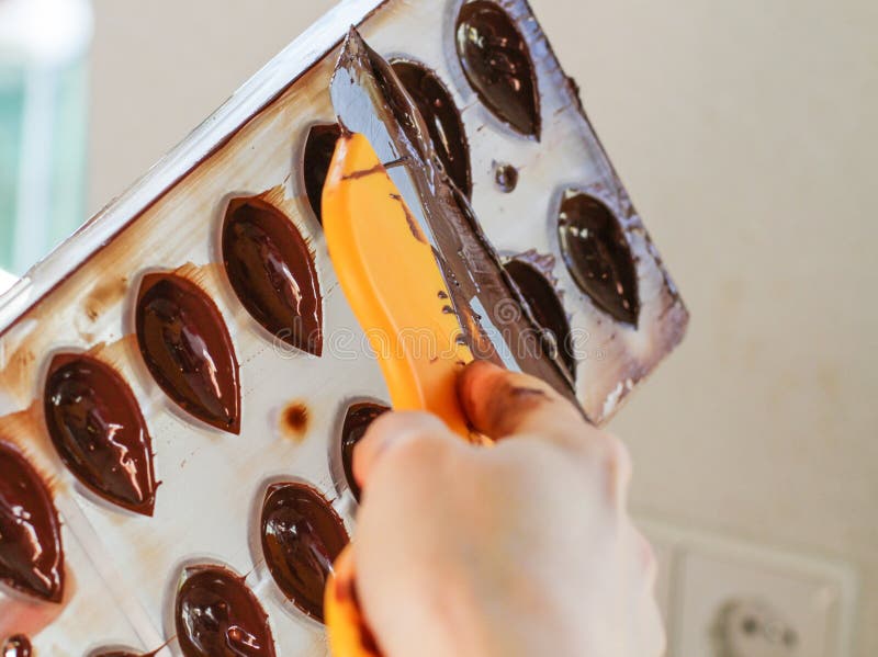 Scraping Chocolate with the Spatula Stock Image - Image of cream ...