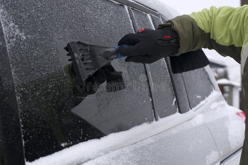 Scraping ice from car stock photo. Image of tool, clean - 211261850