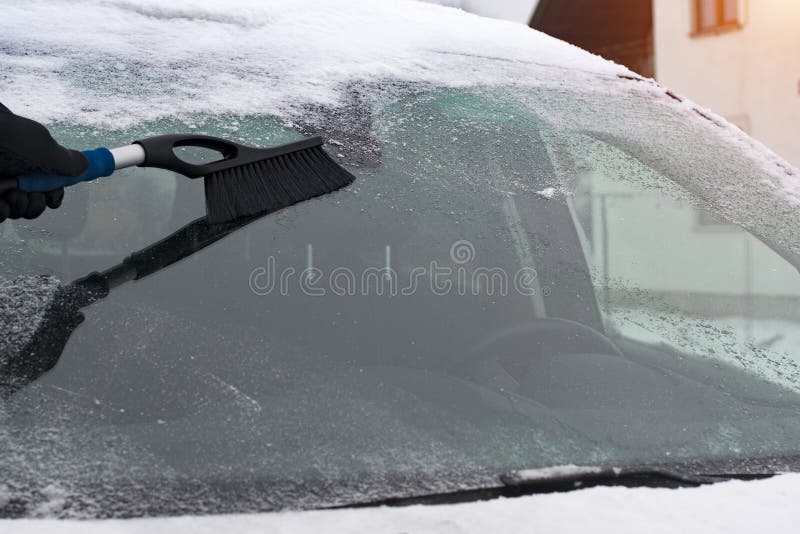 Scraping ice from car stock image. Image of window, windscreen - 209920533