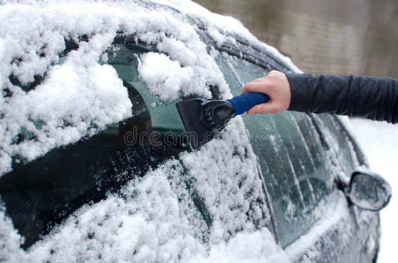 Scraping Snow from the Car Window Stock Photo - Image of snowflake ...