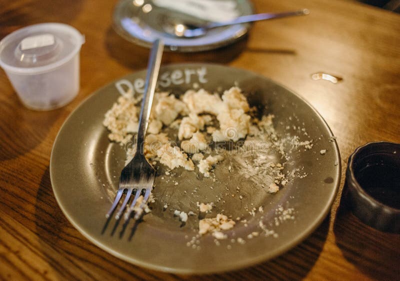 Scraps of Delicious Food in a Plate on the Table Stock Photo - Image of ...