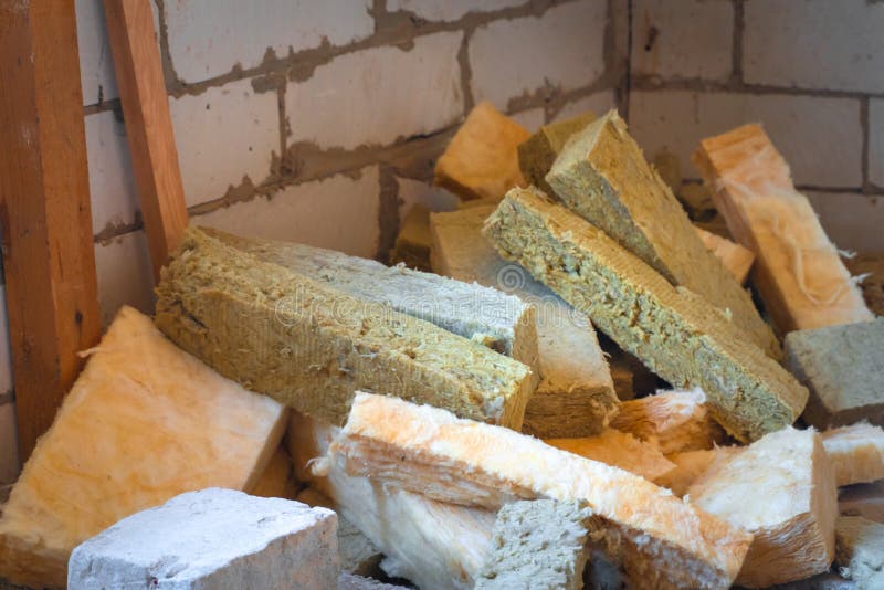 Scraps of Mineral and Glass Wool after Insulation. Remains of Building ...