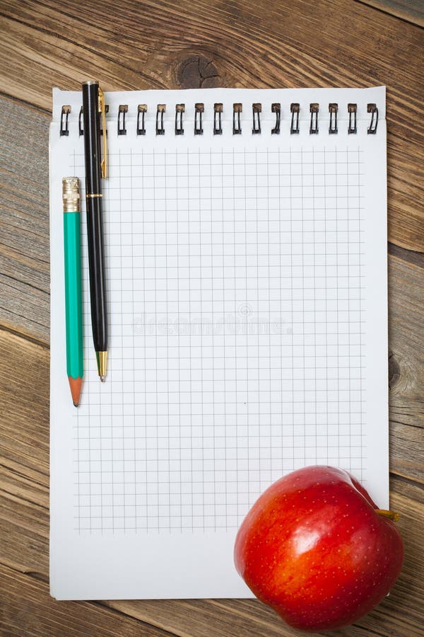 Scratchpad for Taking Notes, a Pen, a Pencil and an Apple Stock Image ...