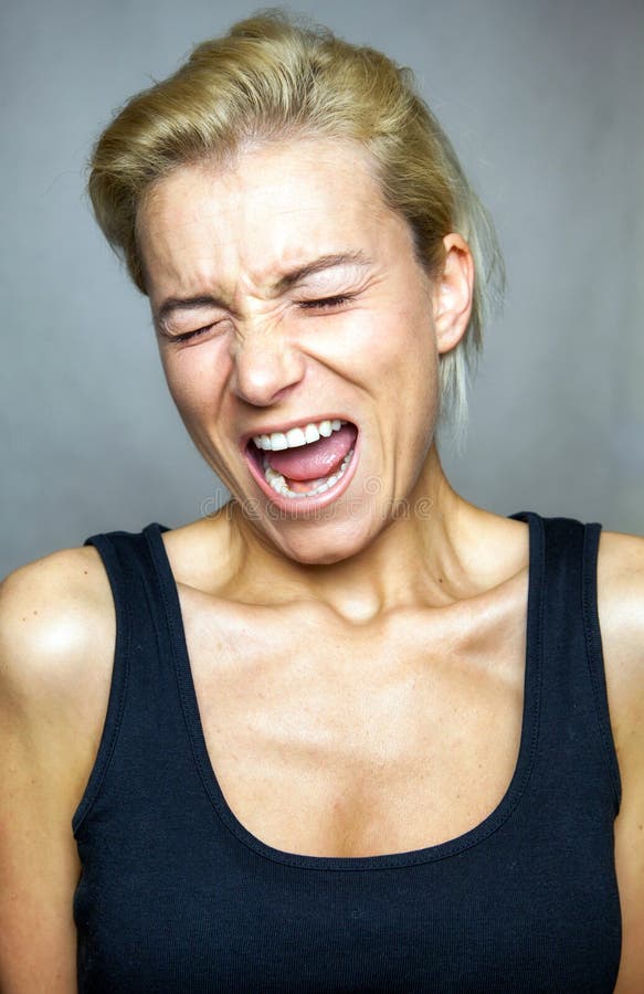 Screaming Expression on the Young Woman`s Face Stock Image - Image of ...