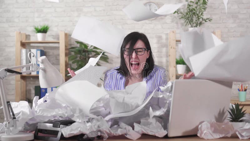 Screaming Expressive Woman Office Worker in a Heaps of Office Papers on ...