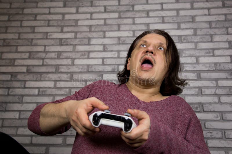 Screaming Gamer Shoots or Attacks in Computer Game. the Concept of ...