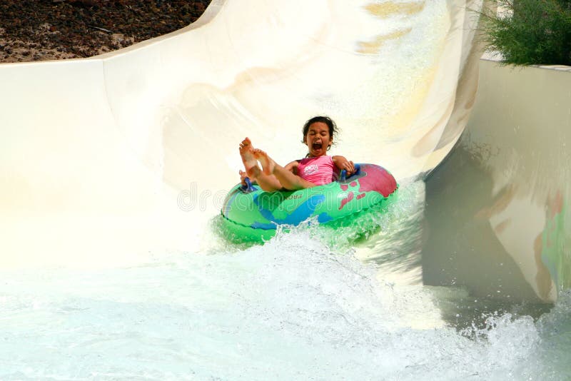 Girl on water slide stock photo. Image of waterpark, park - 20341616