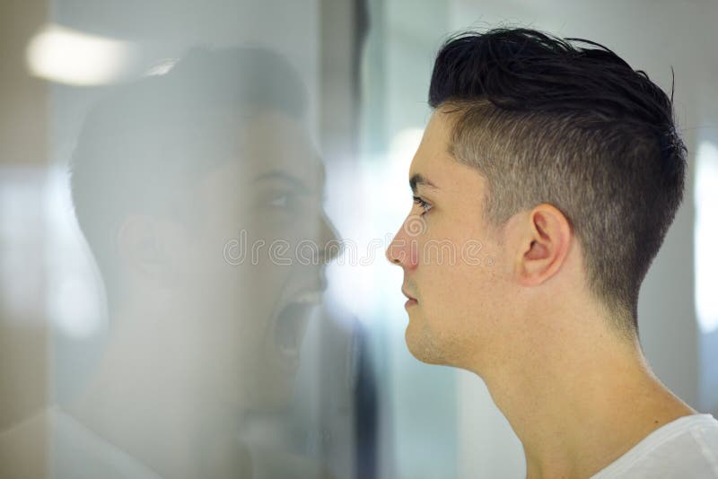 Screaming Inside. Young Man Looking at a Screaming Reflection of ...