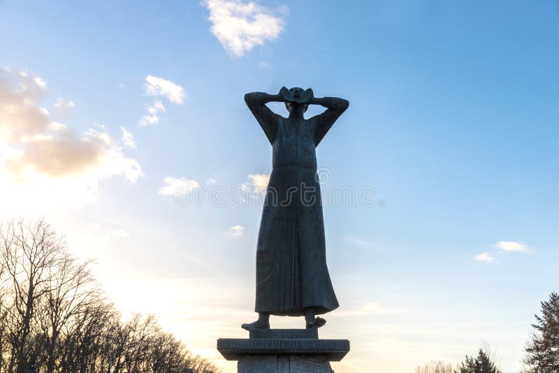 Screaming Statue in Berlin Germany Stock Image - Image of woman, blue ...