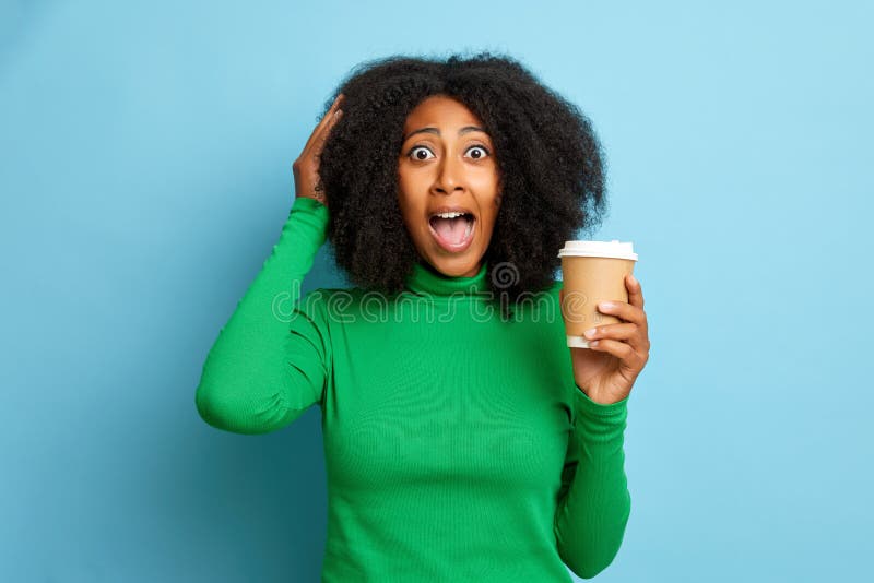 Screaming Young Curly Haired Woman Poses With Coffee Holds Arm On A