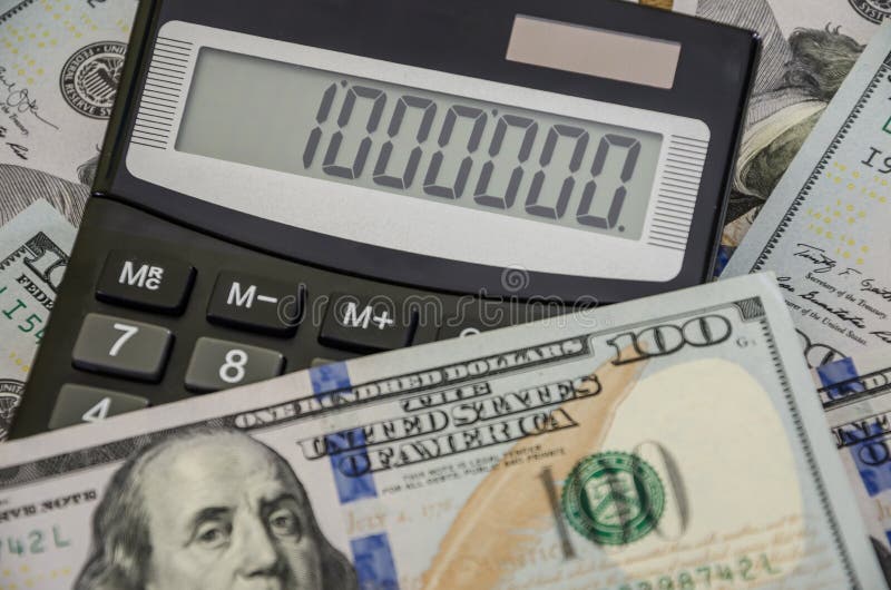 1,000,000 on Screen Calculator and Dollars. Close-up. Stock Photo ...