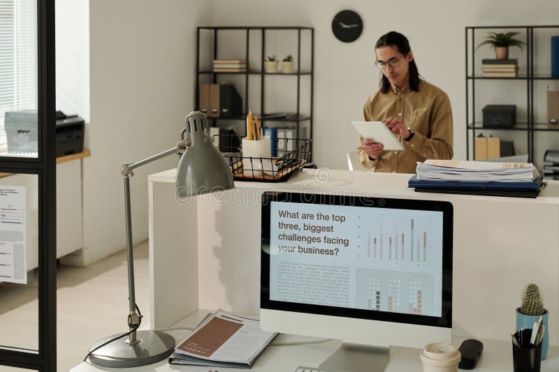 Focus on Computer Monitor with Data and Smartphone with Blank Screen ...