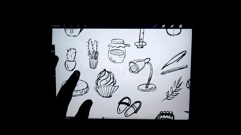 On Screen of Gadget There is Digital Drawing of Small Elements in ...