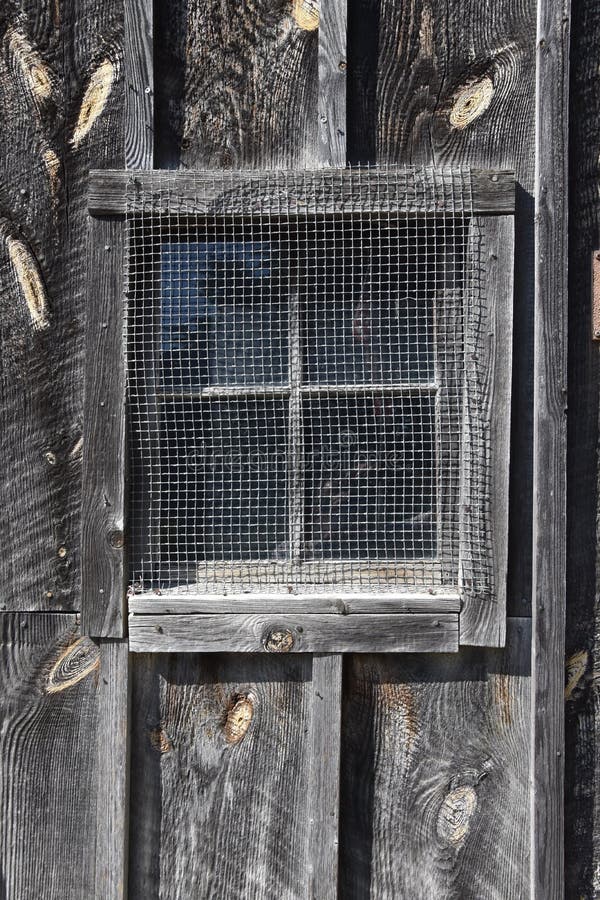 Screened Mesh Over Window of an Old Building Stock Photo - Image of ...
