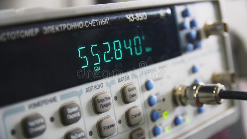 Screen of Frequency Meter Shows Data in Light Room Closeup Stock ...