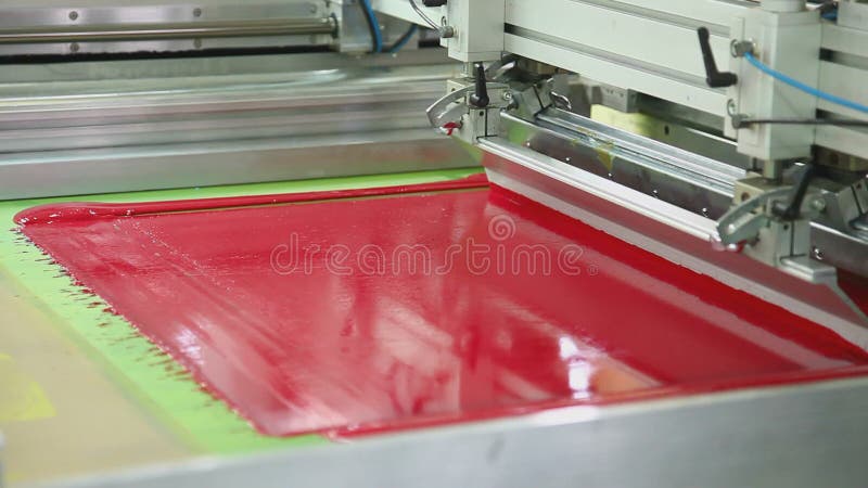 A Screen Printing Worker Looks Busy Mixing Screen Printing Ink in a Jar ...