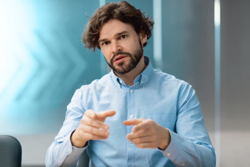 Confident Man Talking To Camera Making Video Call Stock Photo - Image ...