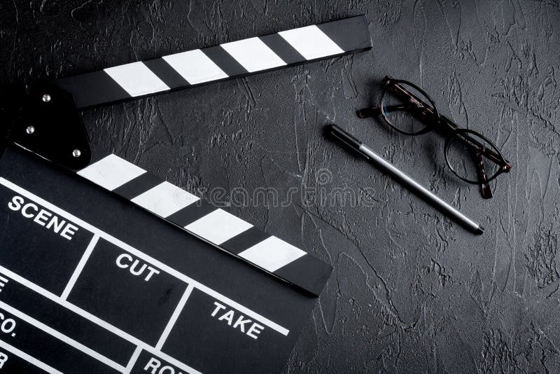 Screenwriter Desktop with Movie Clapper Board Dark Background Top View ...
