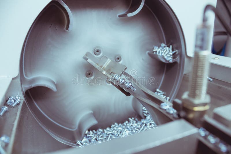 In feeder of machine. stock photo. Image of automated - 117728440