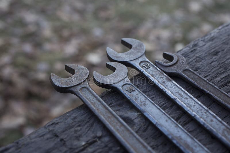 Old keys on workbench A stock image. Image of wooden - 33777551