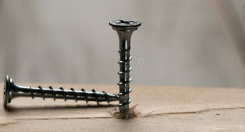 The is Screwed into a Piece of Board Stock Image - Image of plank ...