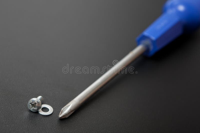 Screwdriver and bolt stock image. Image of tool, small - 10530681