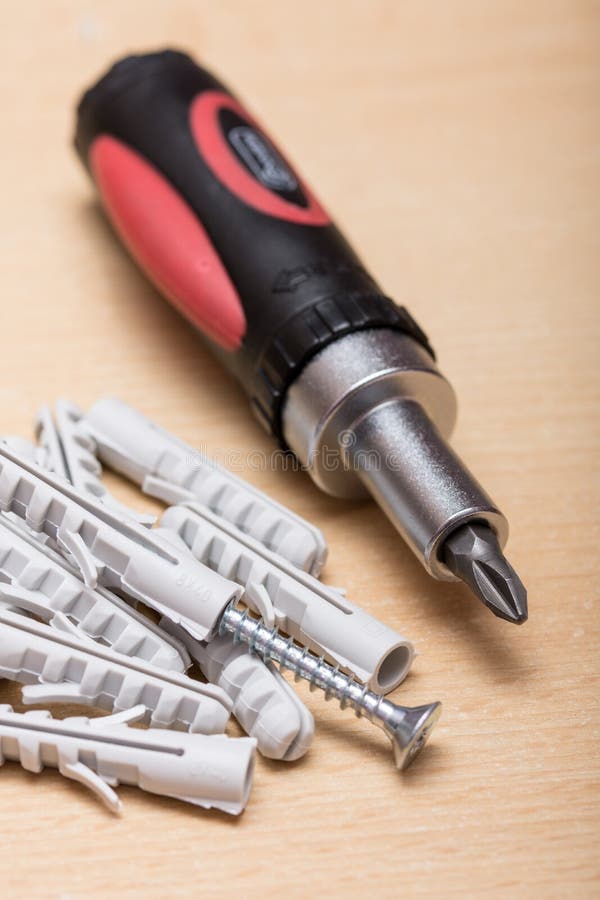 Screwdriver Cross Bit with Plastic Dowels Stock Photo - Image of ...