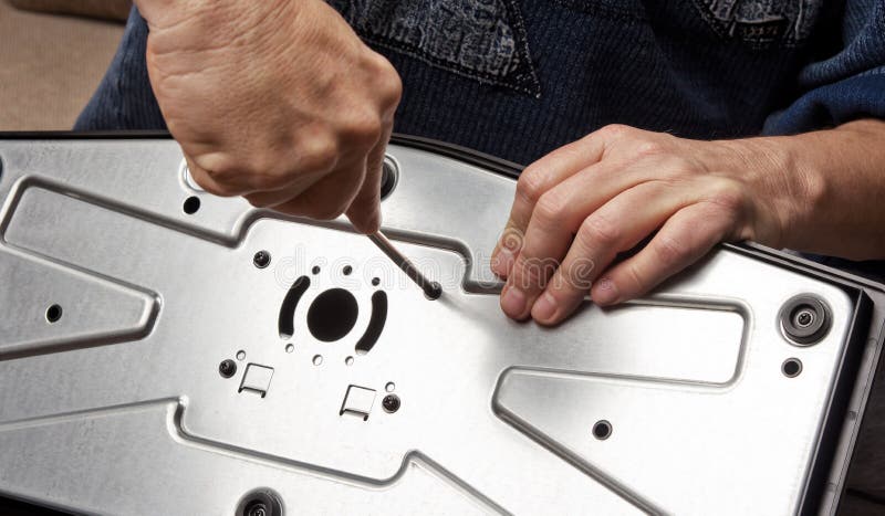 Screwdriver in hand stock photo. Image of diagonal, equipment - 75572332