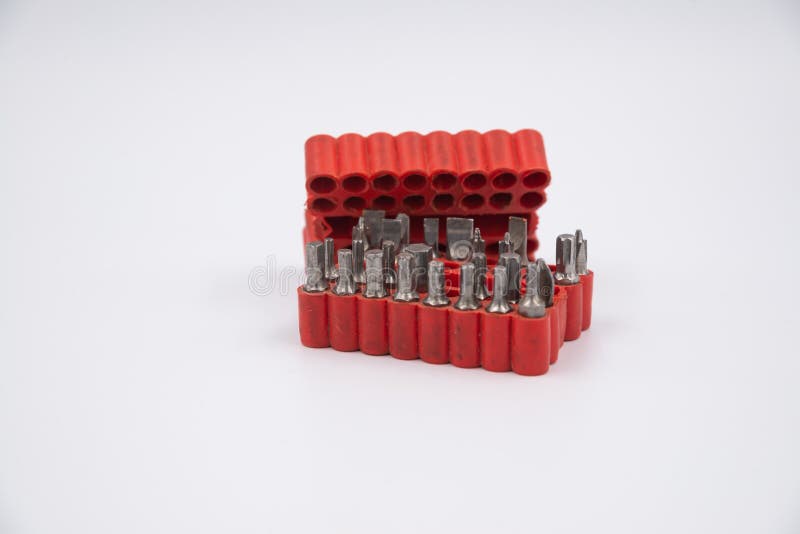 Screwdriver Head Set in a Red Rubber Package Isolated on a White ...